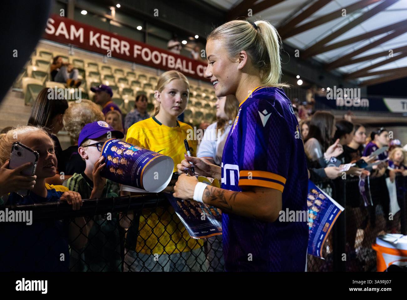 Georgia Cassidy (8 Perth Glory) with fans after the Ninja A League ...