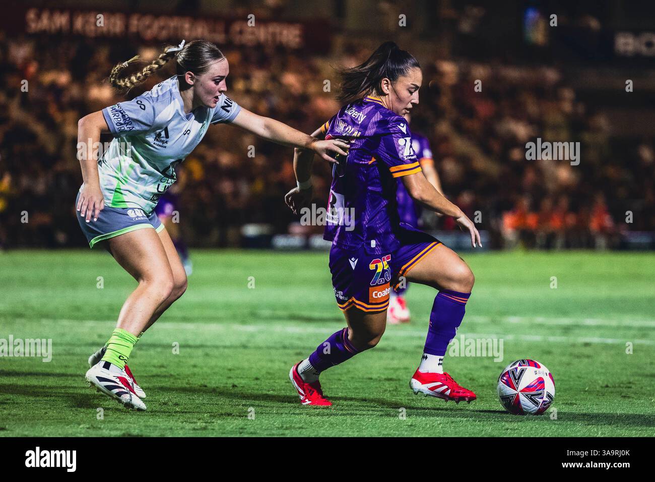 Ella Lincoln (25 Perth Glory) protects the ball during the Ninja A ...