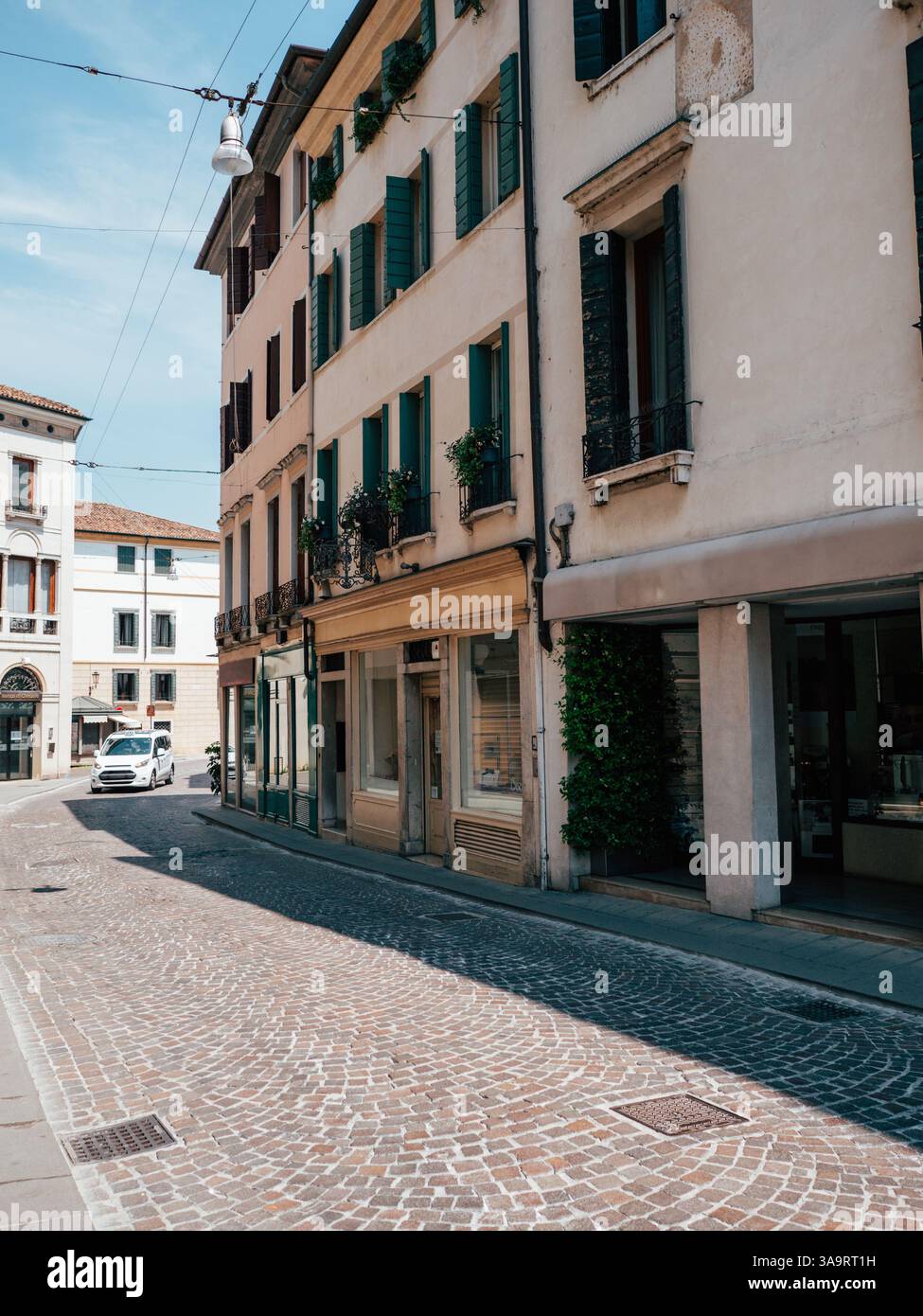 Explore charming cobblestone streets hi-res stock photography and ...