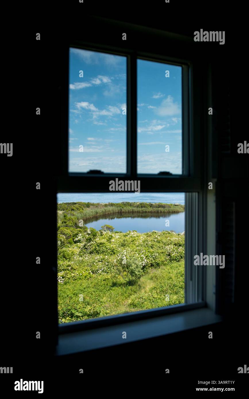 Serene Coastal View Through Window Stock Photo - Alamy