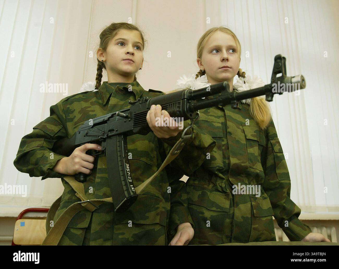 Girl`s Cadet School in Moscow - girls-cadets observing Kalashnikov ...