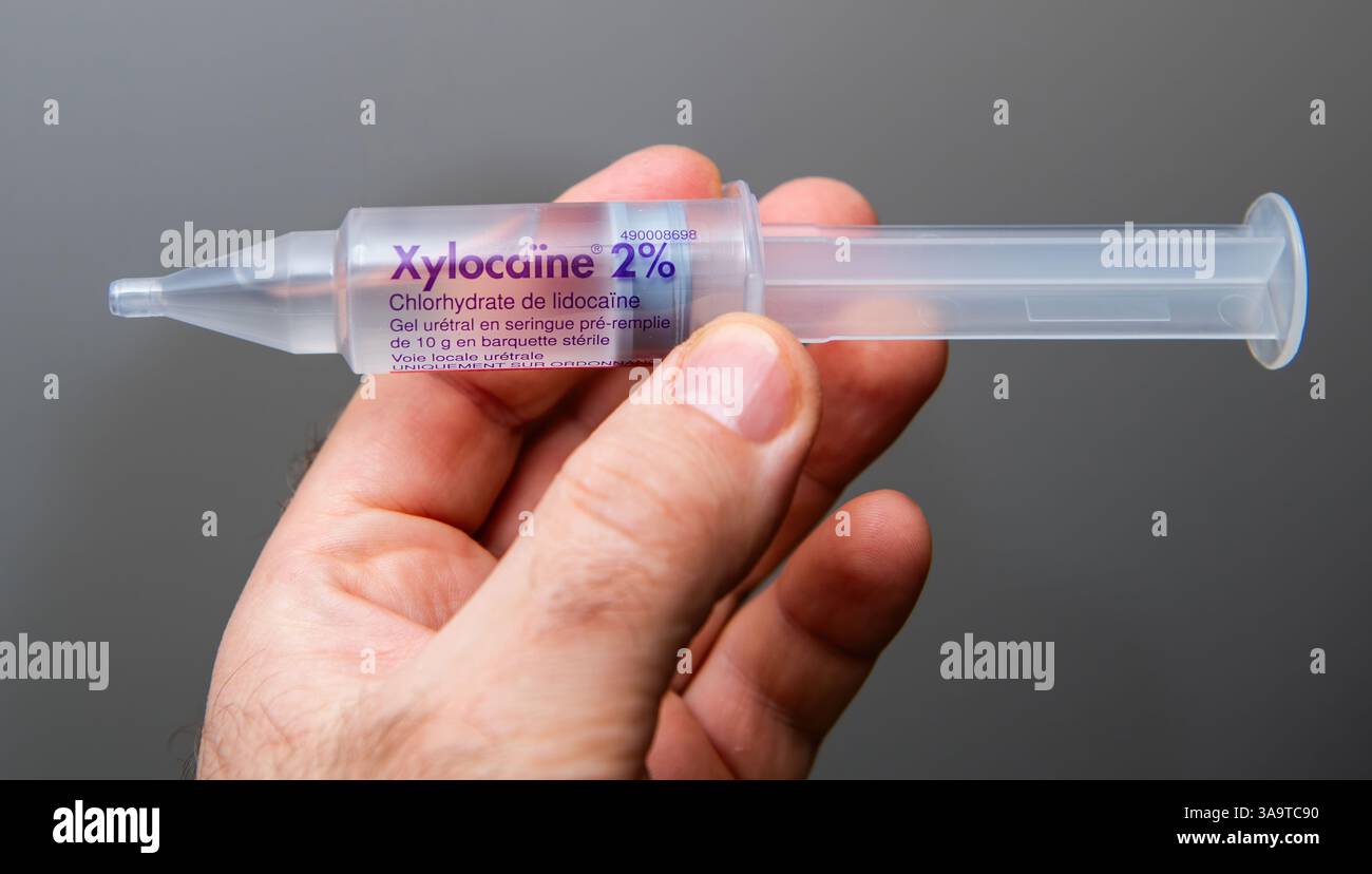 Paris, France - Mar 10, 2025: A person holds a pre-filled 10g sterile ...