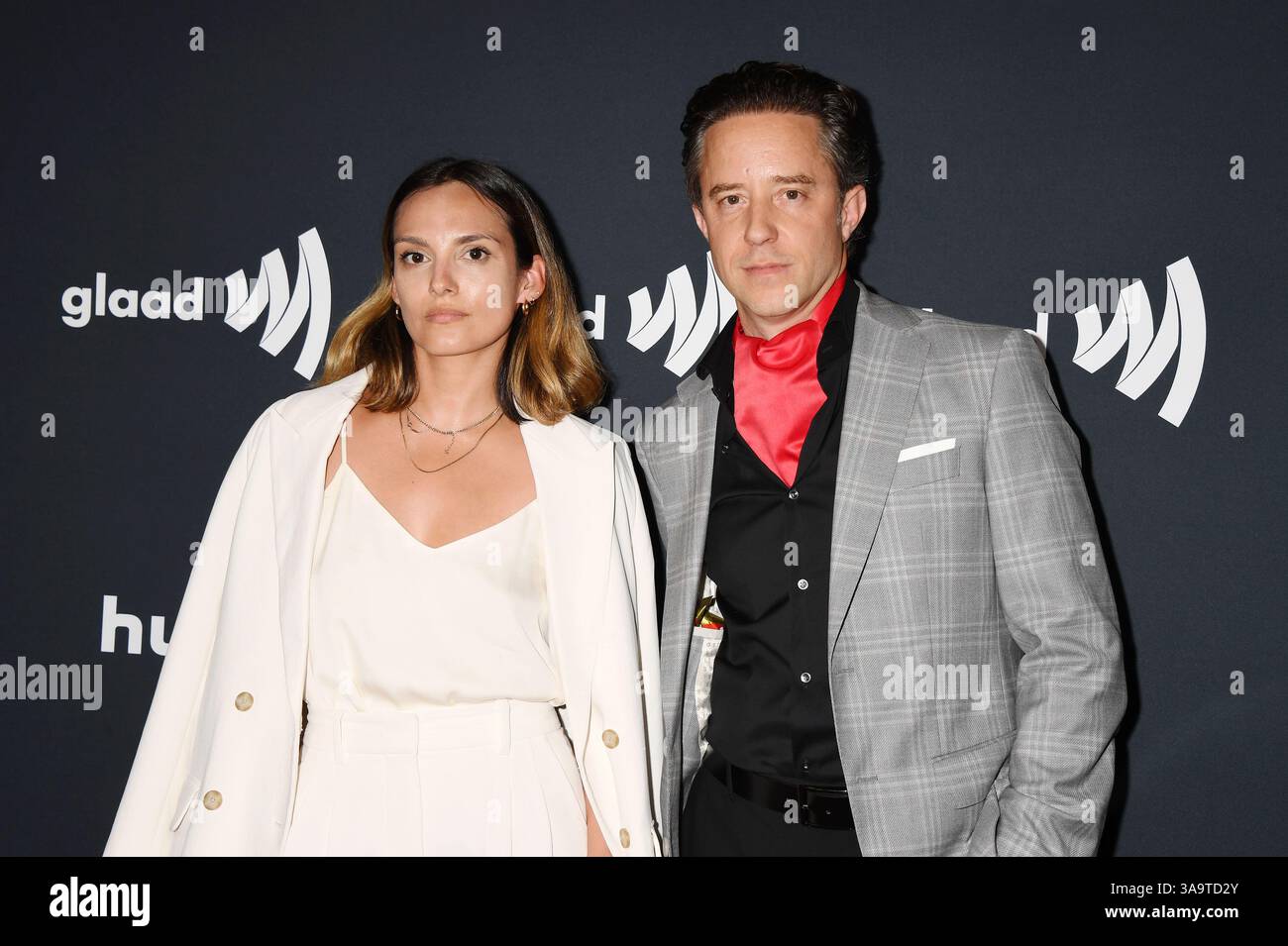 BEVERLY HILLS, CALIFORNIA - MARCH 27: Kantu Lentz and Ryan M. Murphy ...
