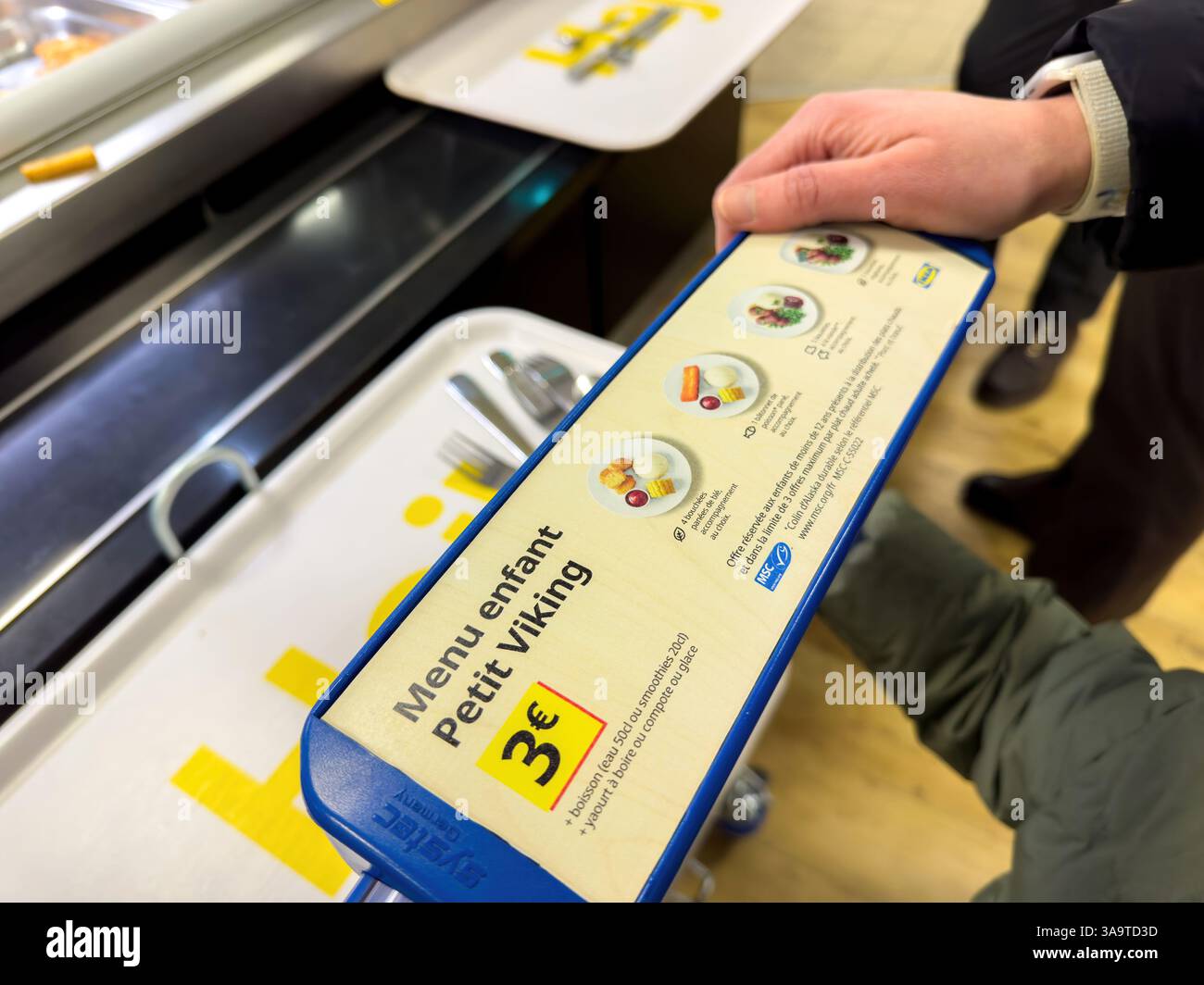 Paris, France - Mar 15, 2025: A person holds a children Petit Viking ...