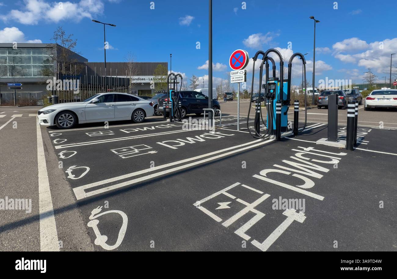 Paris, France - Mar 27, 2025: Electric vehicle charging area in a ...