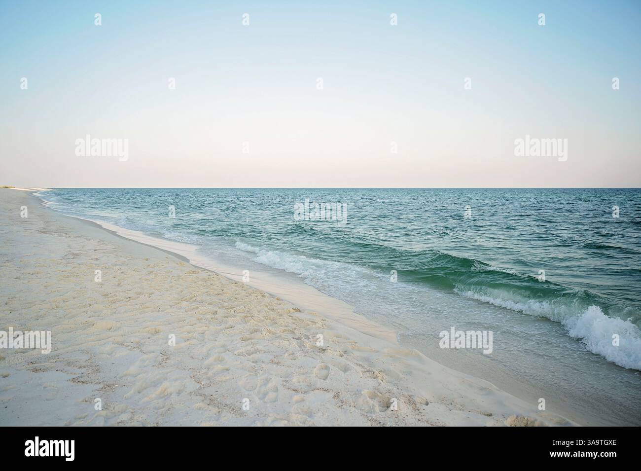 Serene empty beach gentle waves hi-res stock photography and images - Alamy