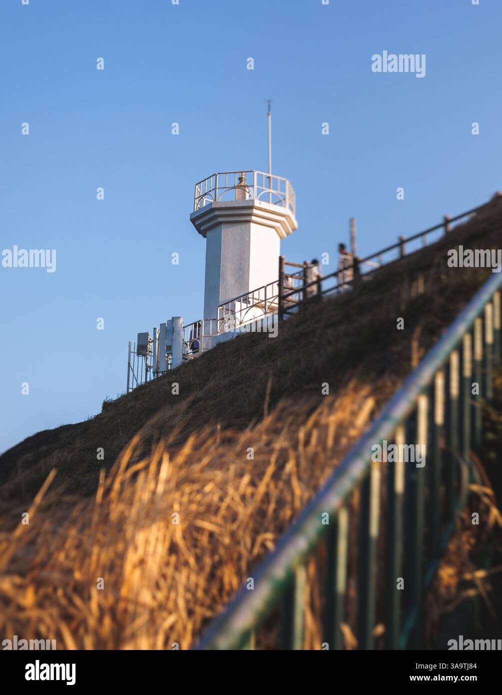 Jeju-do, Seopjikoji cape landscape with lighthouse and sea, east coast ...