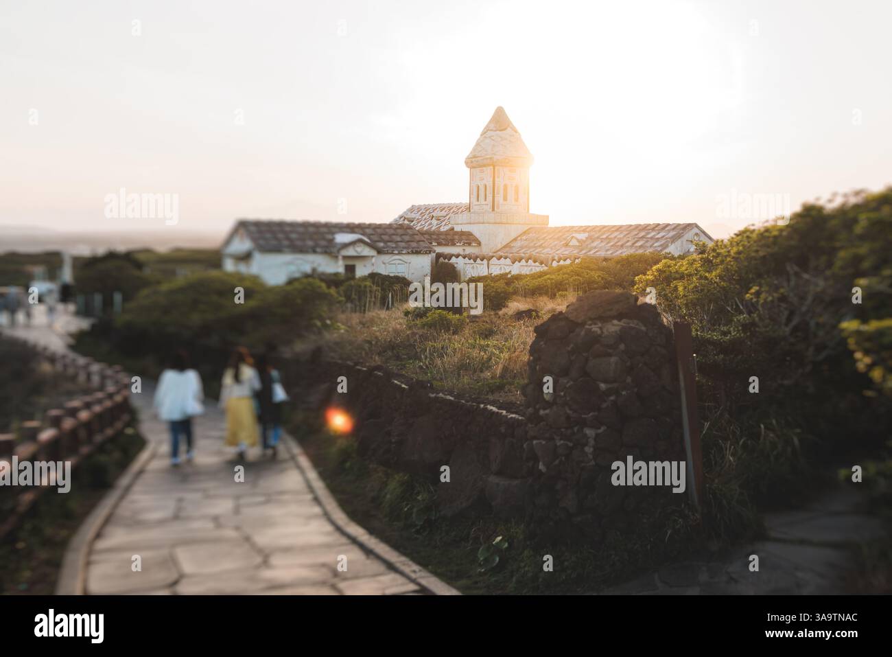 Jeju-do, Seopjikoji cape landscape with lighthouse and sea, east coast ...