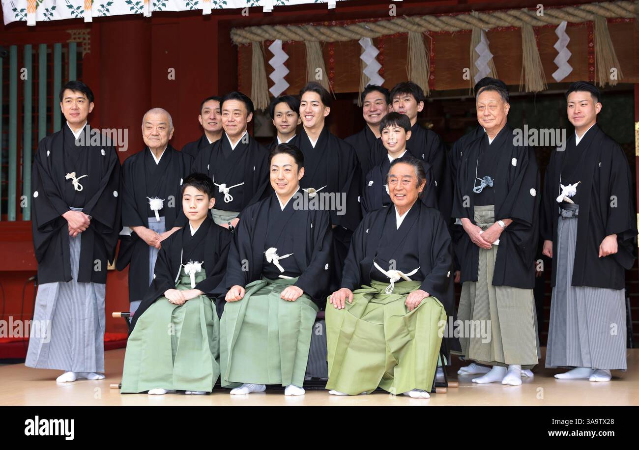 Kabuki actor Onoue Kikunosuke (front row center), his son Onoe ...