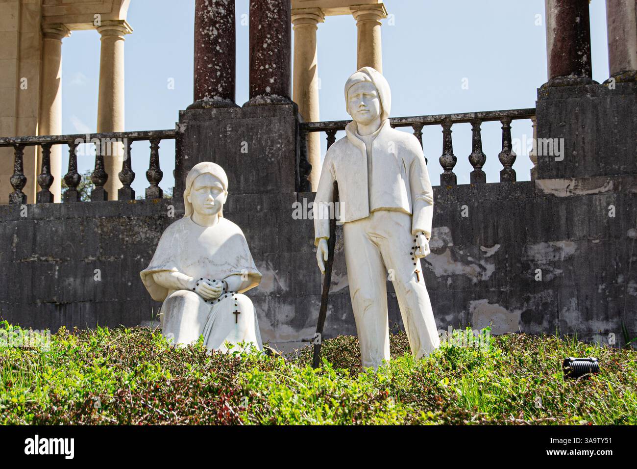 Fatima, Portugal - March 26, 2025: Statues of two contemplative figures ...