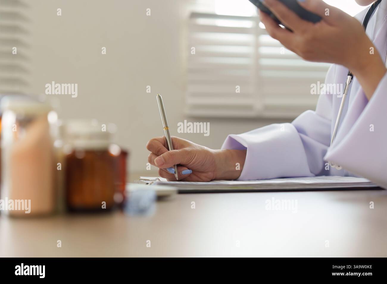 Telemedicine and Note-Taking. A healthcare professional engages in ...