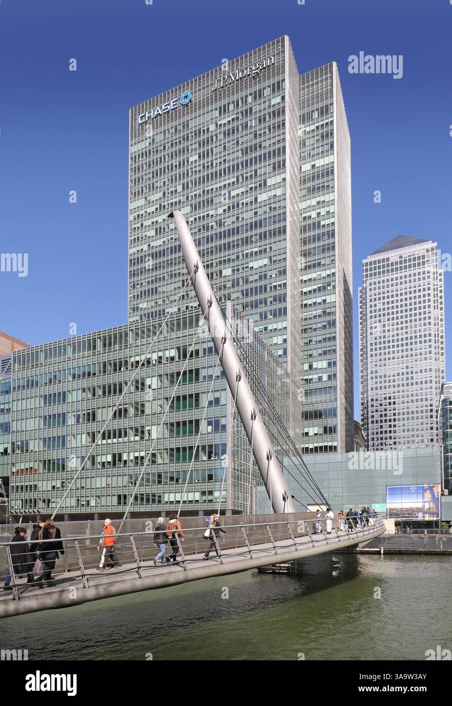 Canary Wharf Development, London, UK. Footbridge across south dock. Shows J P Morgan building ...