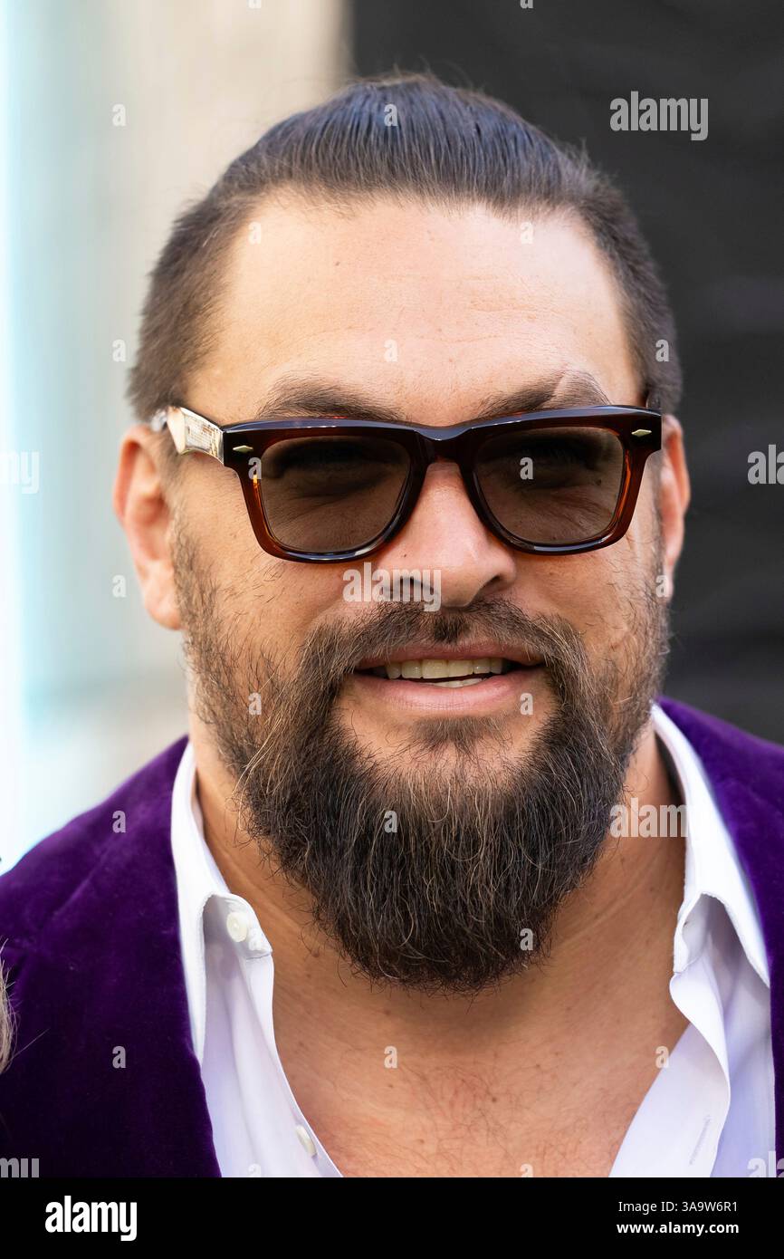 Jason Momoa pose for photographers upon arrival at the World premiere ...