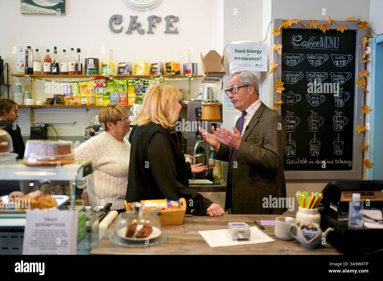 Reform UK leader Nigel Farage visits a cafe during a walkabout in Hythe ...