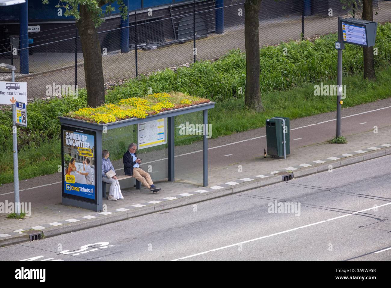 Utrecht, the Netherlands. 8 June 2024. Modern bus stop with roof garden ...