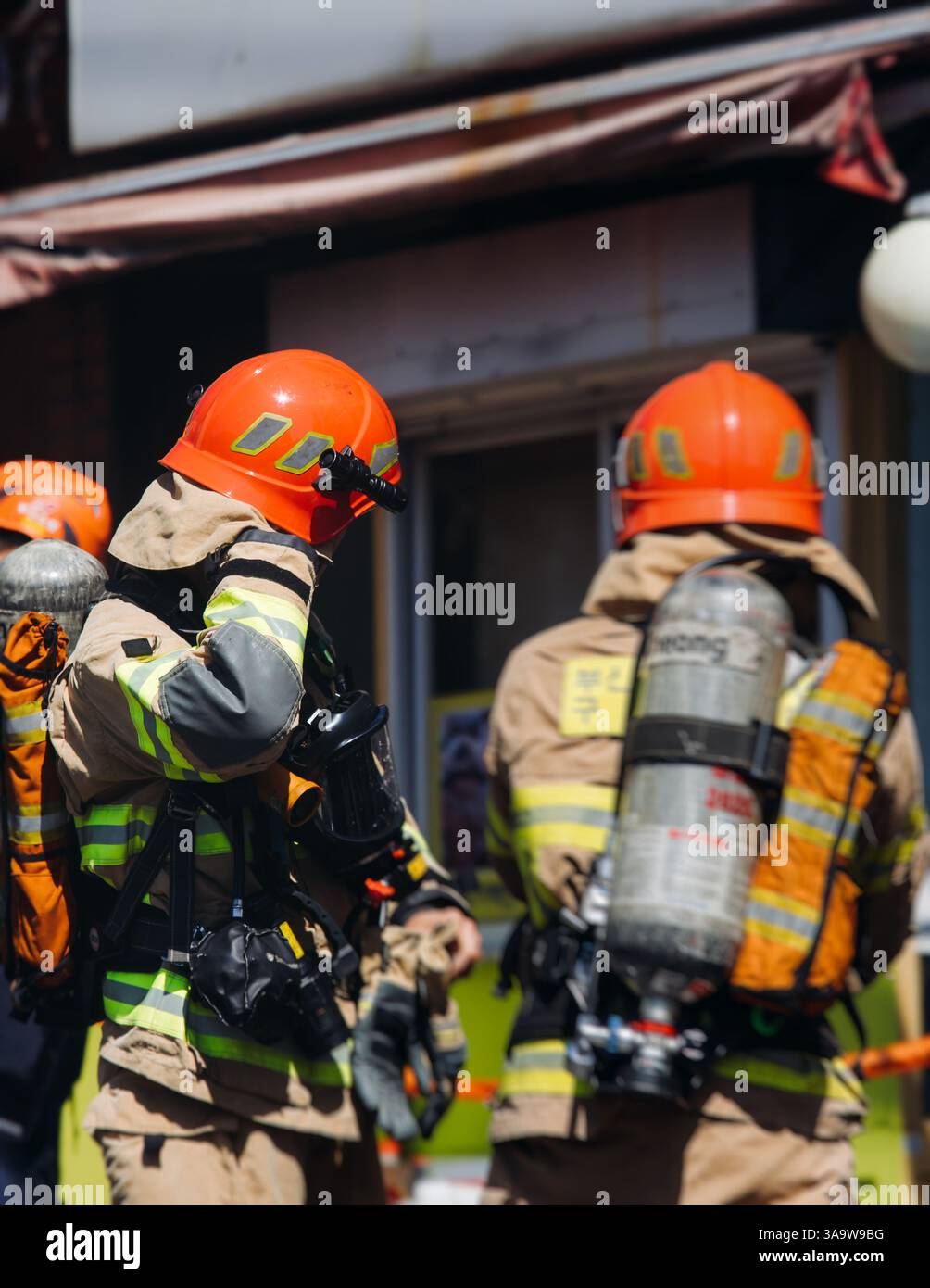 Group of South Korean fire men during fire fighting operation in the ...