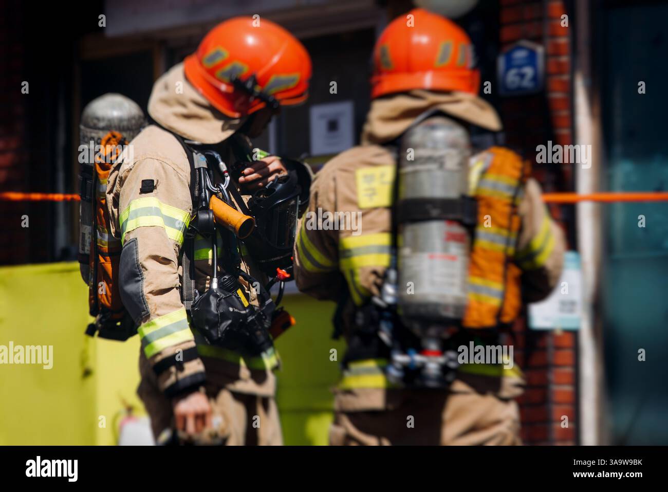 Group of South Korean fire men during fire fighting operation in the ...
