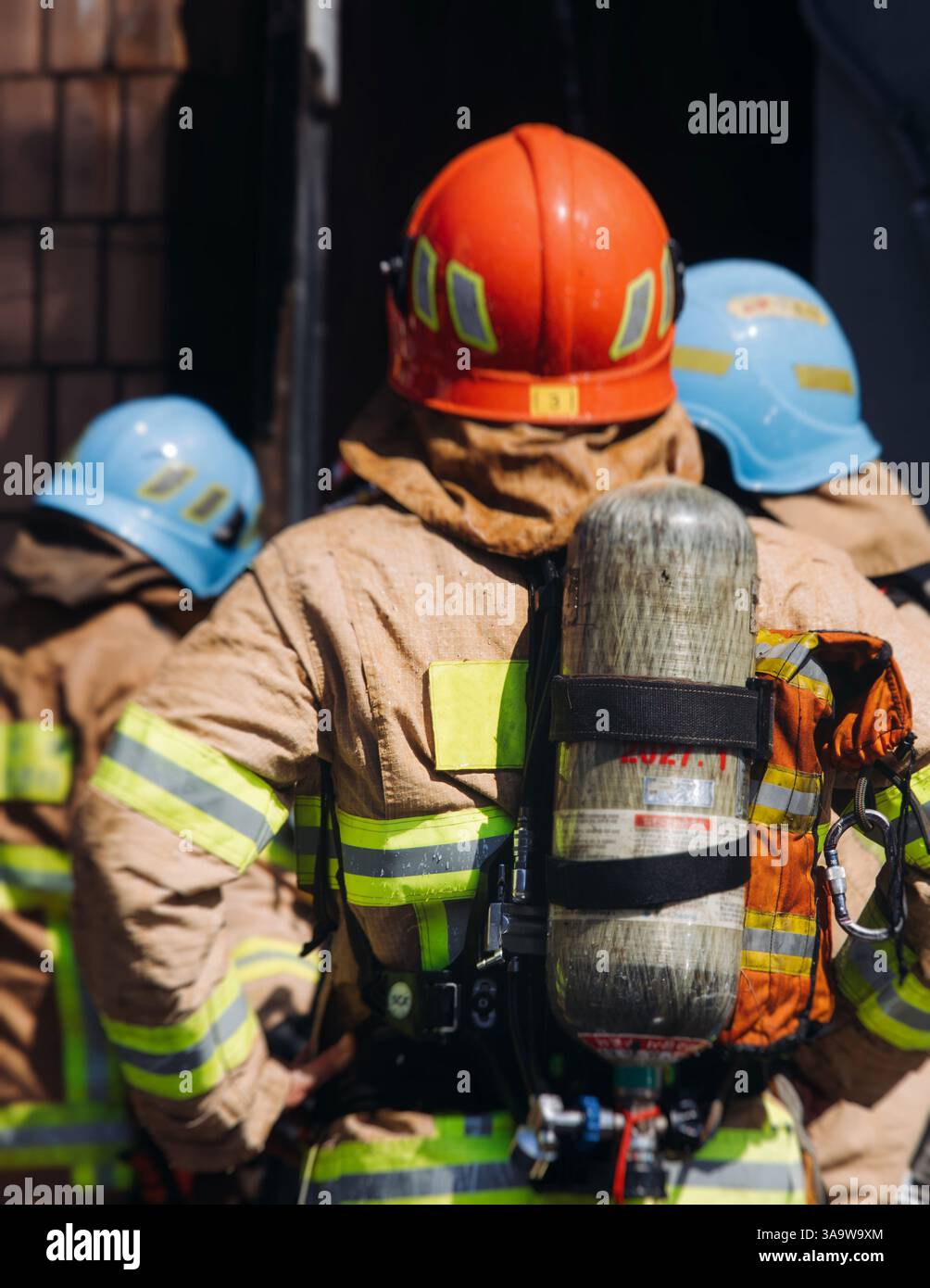 Group of South Korean fire men during fire fighting operation in the ...