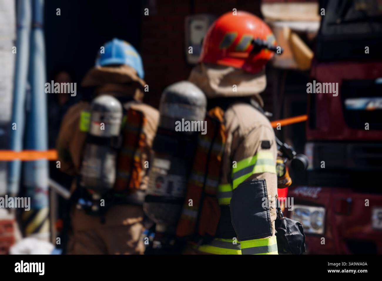 Group of South Korean fire men during fire fighting operation in the ...