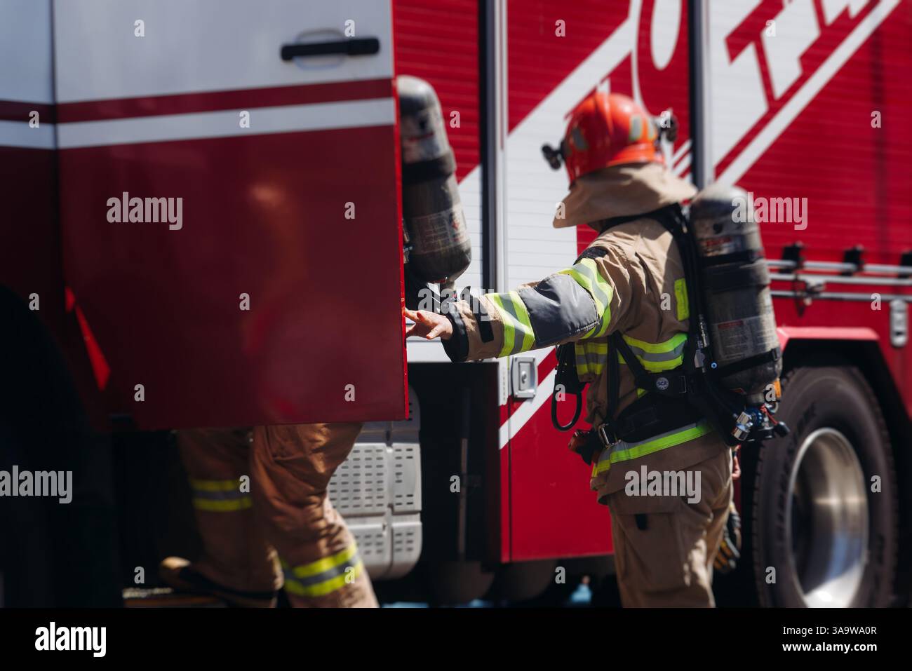 Group of South Korean fire men during fire fighting operation in the ...