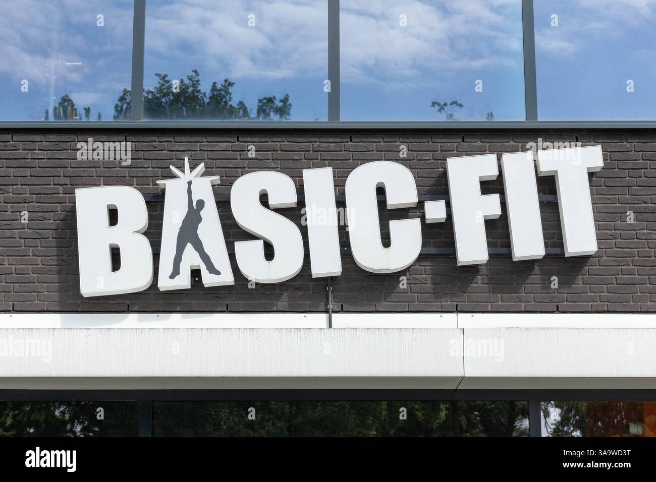 Utrecht, the Netherlands. 6 June 2024. White Basic-Fit logo sign at the ...