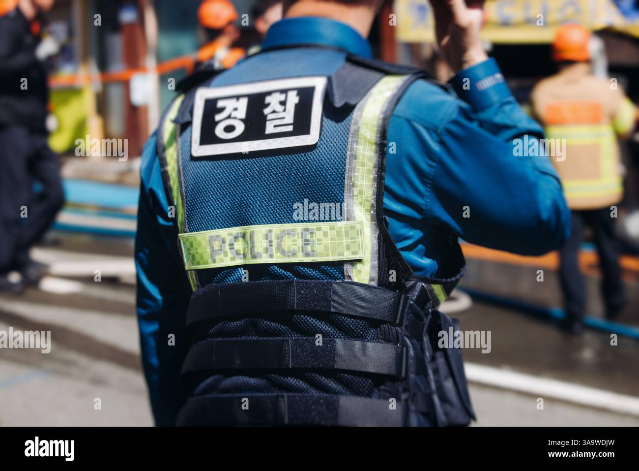 Korean police squad formation in uniform with "Police" logo, policemen ...