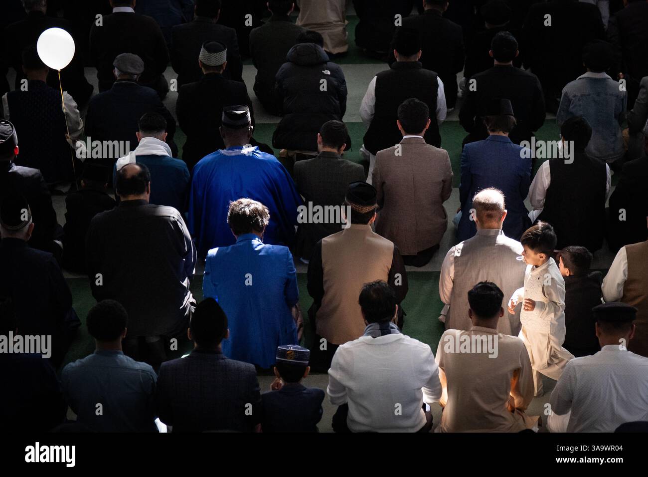 Members of the Ahmadiyya Muslim community during prayer as they gather ...