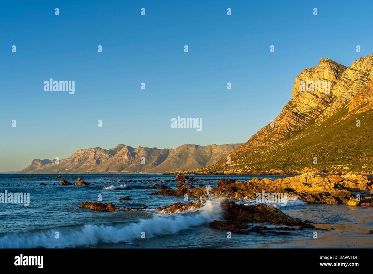 Evening views towards Gordons Bay and the Kogelberg Mountains across ...