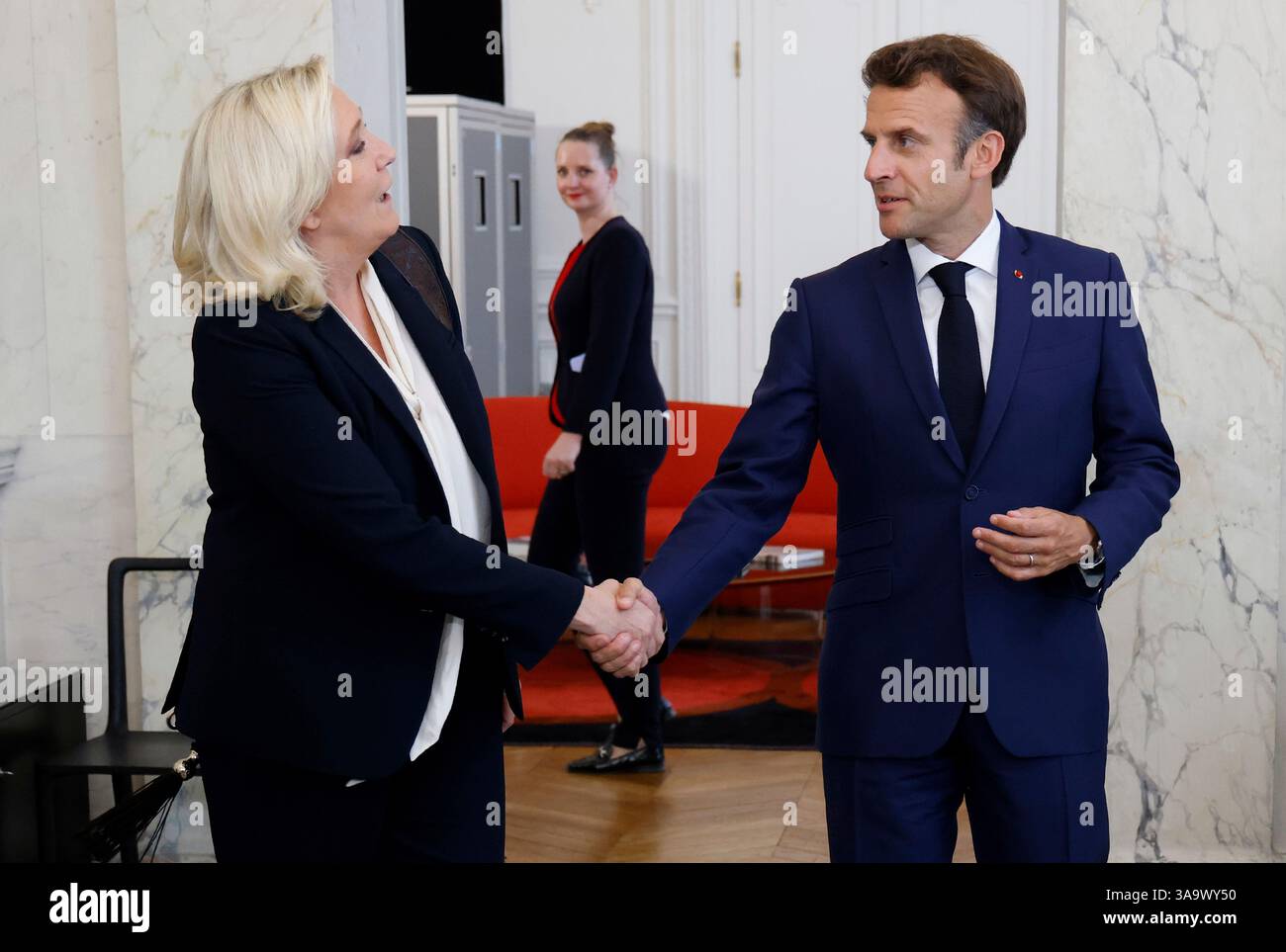 FILE - French President Emmanuel Macron, right, meets French far-right ...