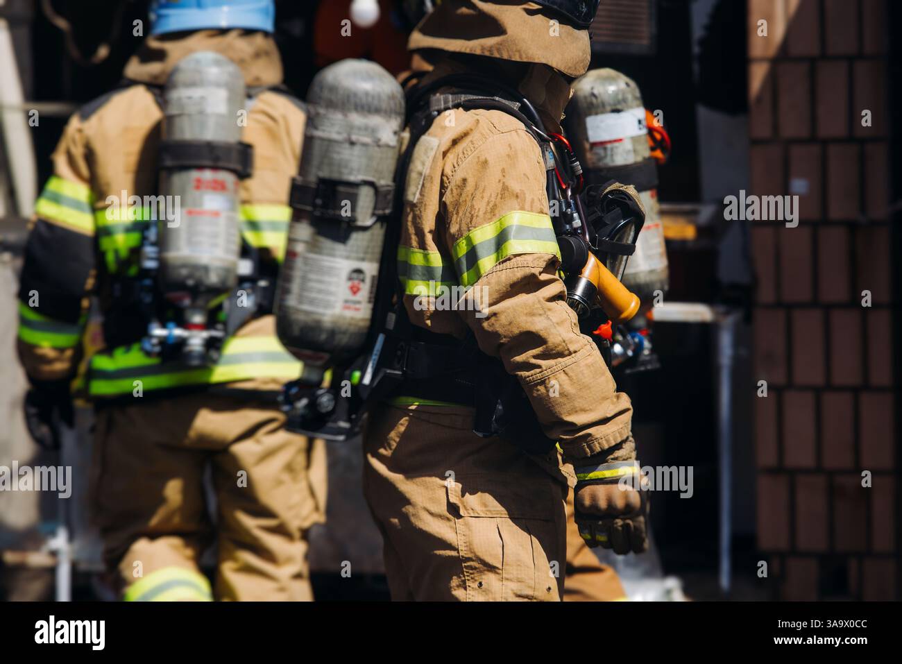Group of South Korean fire men during fire fighting operation in the ...