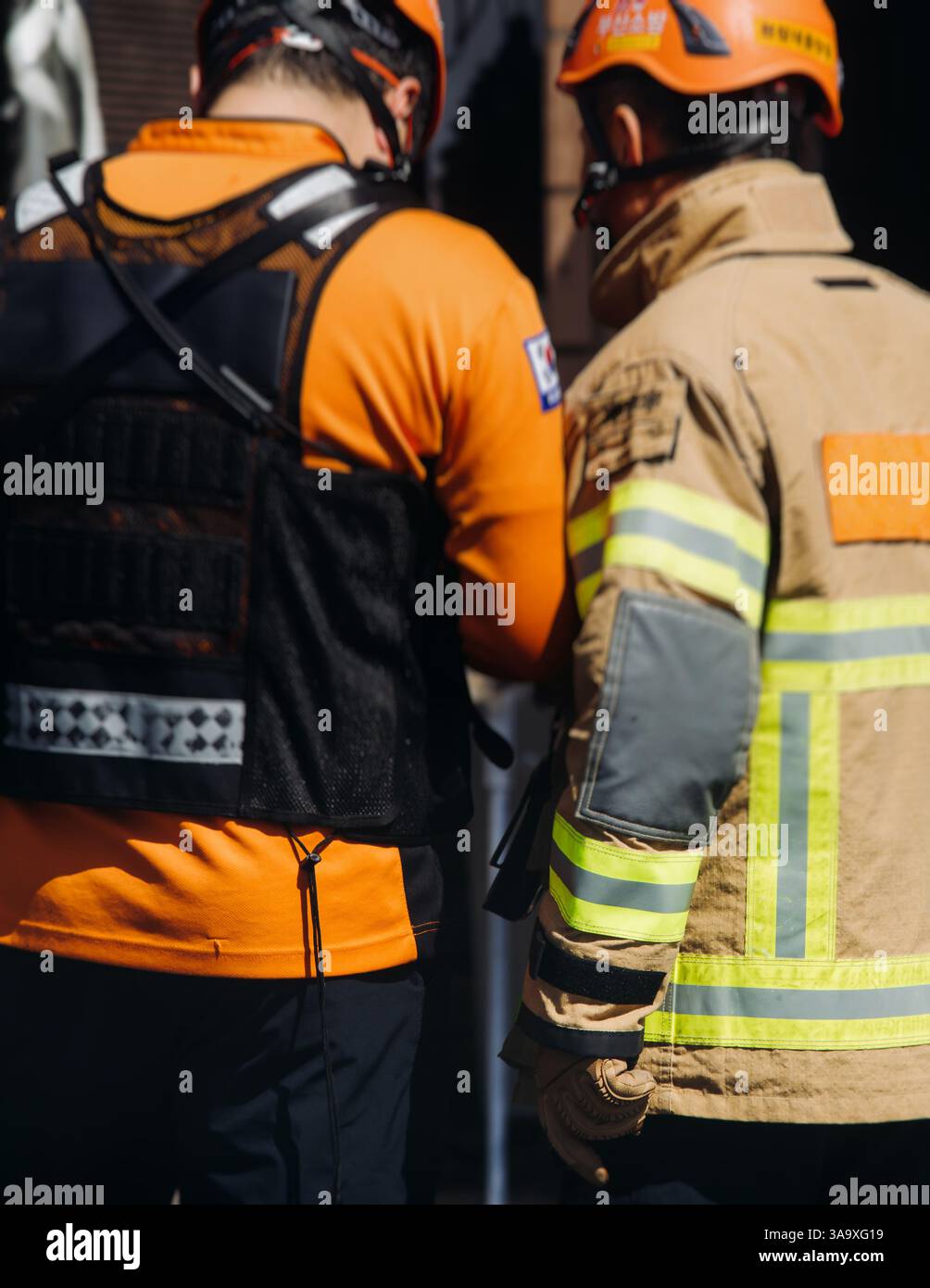 Group of South Korean fire men during fire fighting operation in the ...