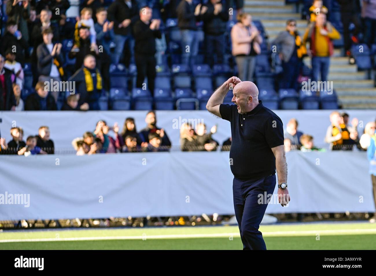 Falkirk, Scotland, UK. 30th March, 2025. Livingston manager David ...