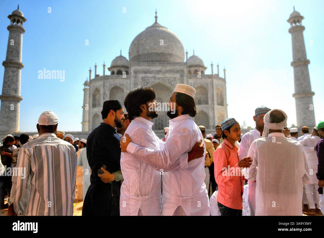 Agra, India. 31st Mar, 2025. Muslim devotees greet each other after ...