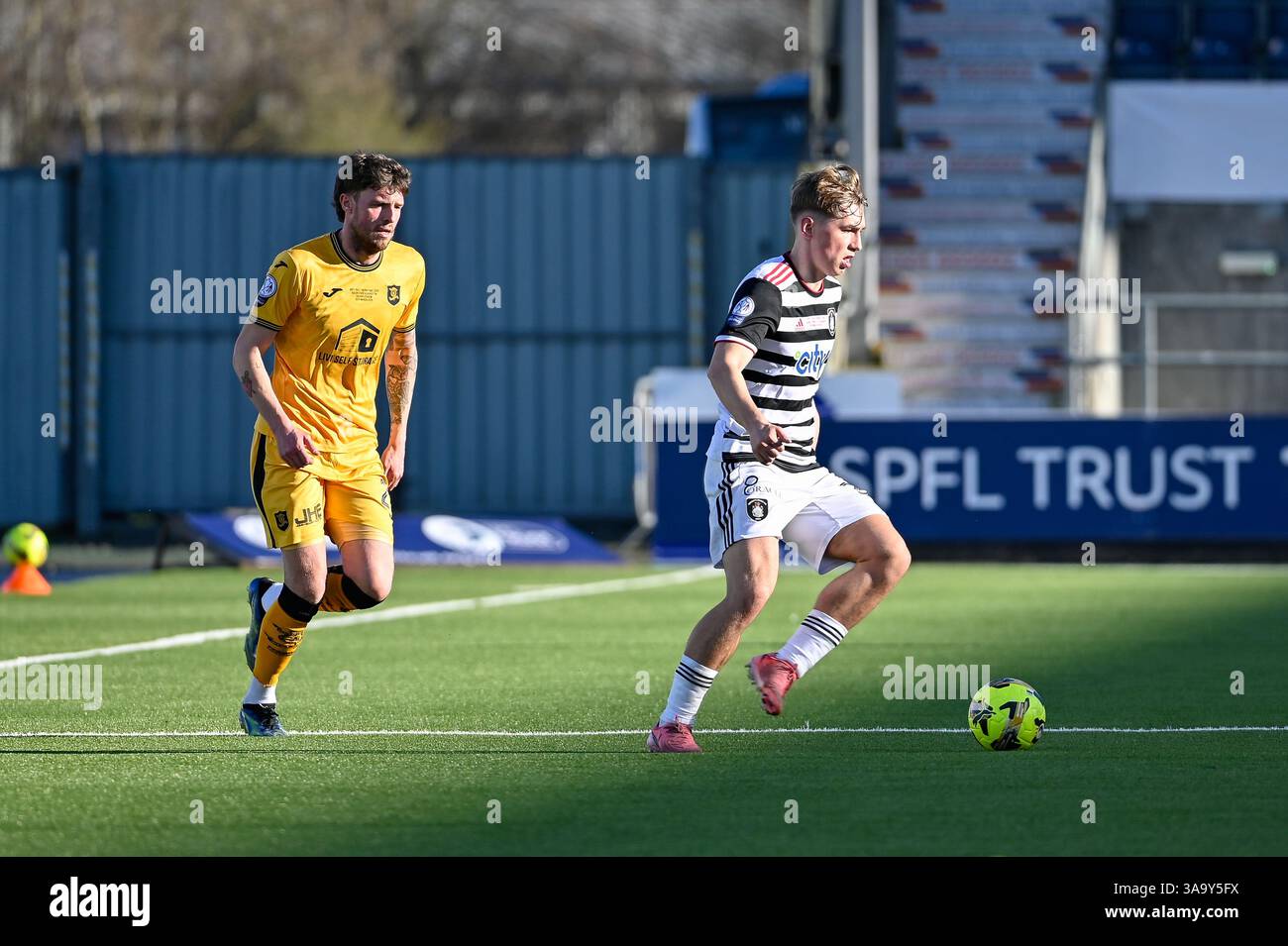 Falkirk, Scotland, UK. 30th March, 2025. Adam Montgomery of Queen's ...