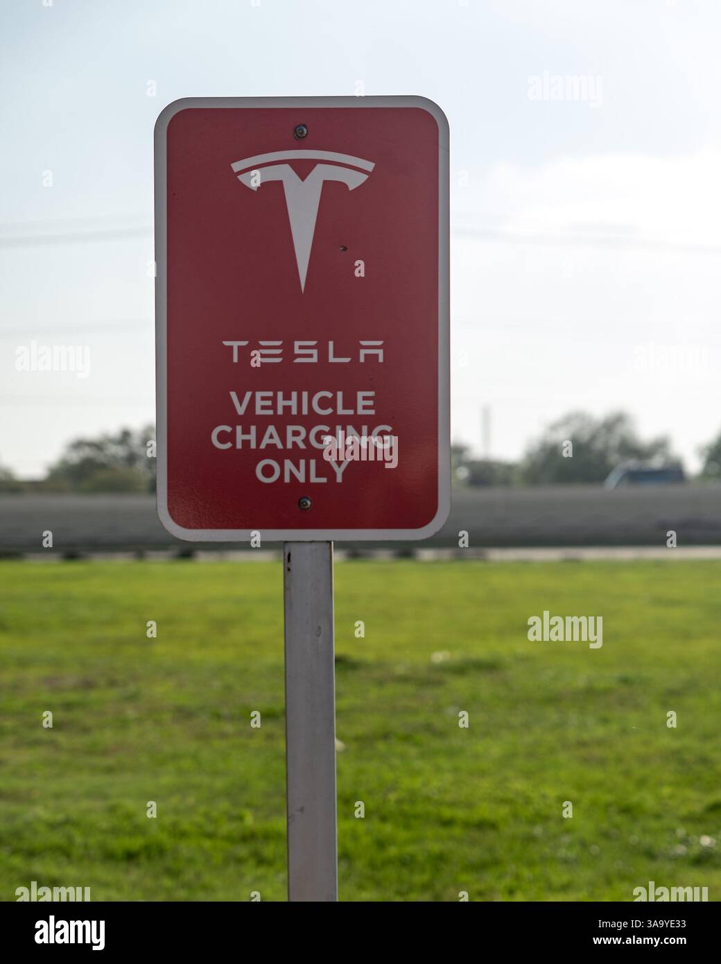 Webster, USA. 29th Mar, 2025. A Tesla Supercharger station in Webster ...