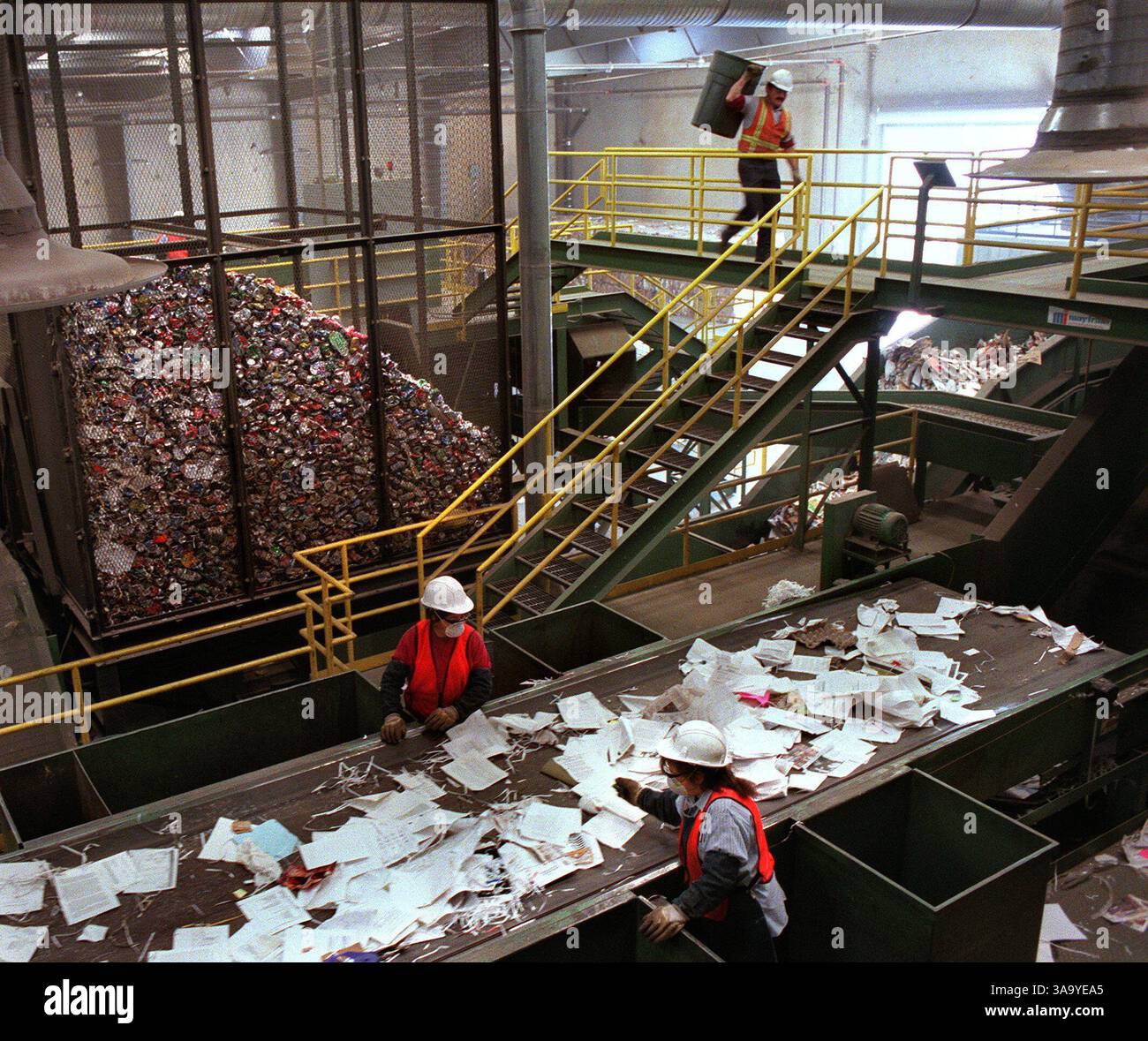 Sacramento Recycling & Transfer Station employees sort white office ...