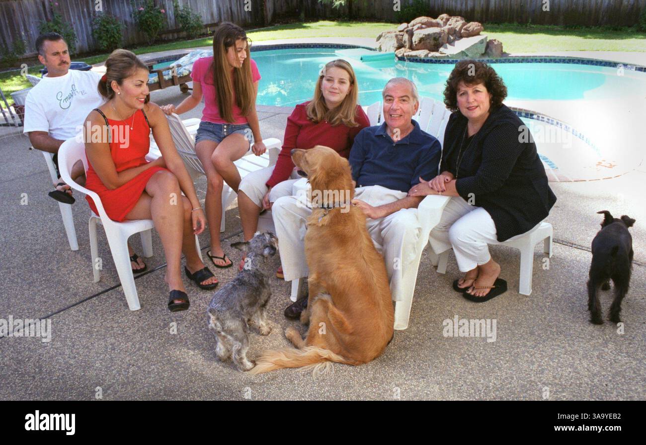 Roger Peterson with wife Susi (on right) with daughters Nicole (with ...