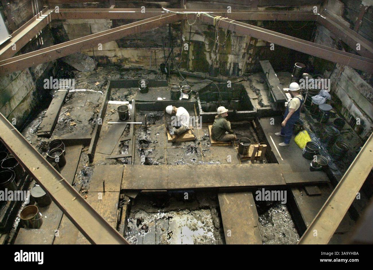 Page Museum workers excavate bones from Pit 91 at the La Brea Tar Pits ...