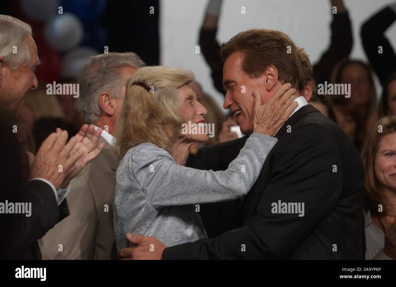 Arnold Schwarzenegger with Eunice Shriver as he celebrates his victory ...