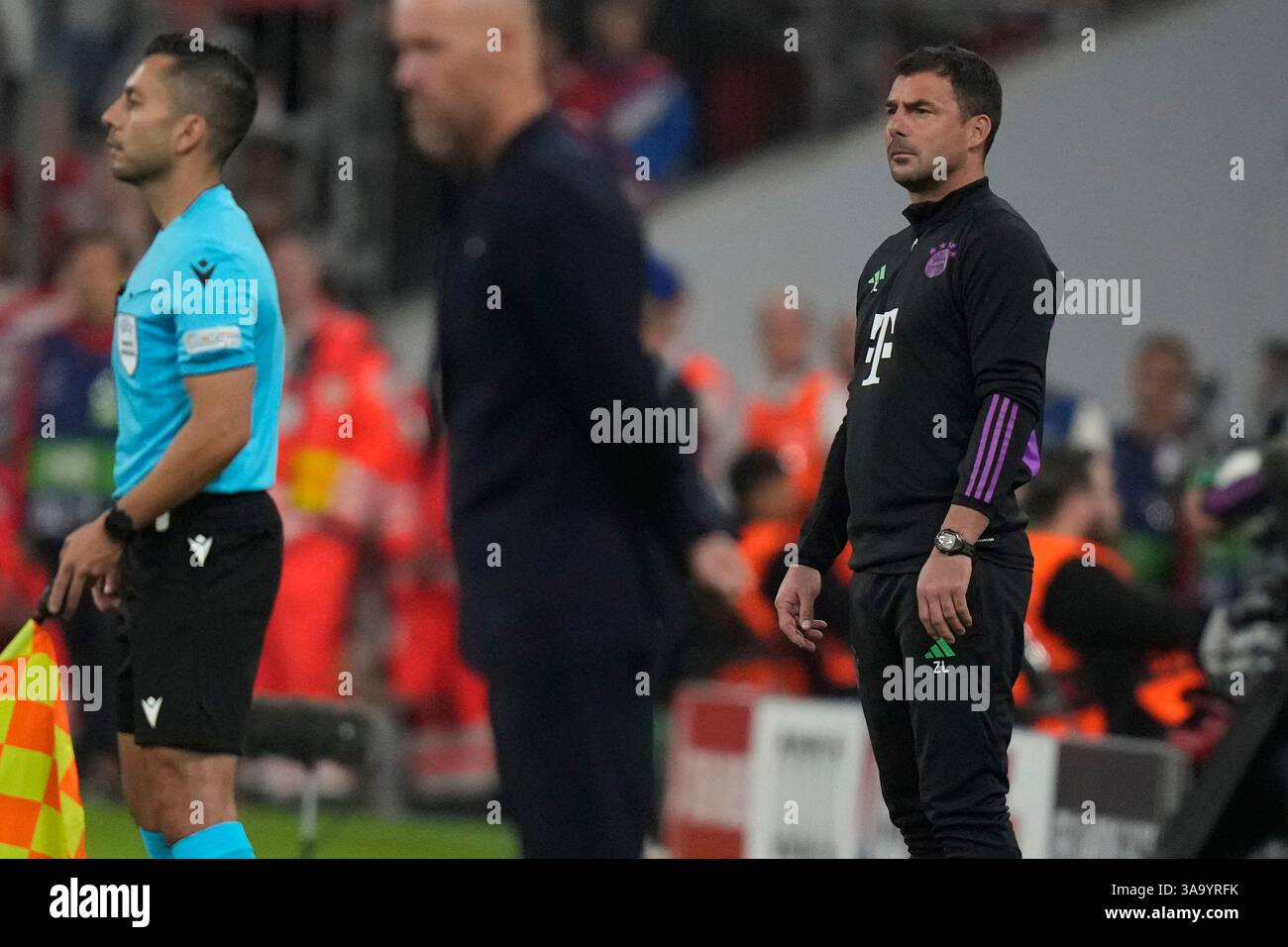 FILE - Bayern's assistant coach Zsolt Low, right, observes during the ...