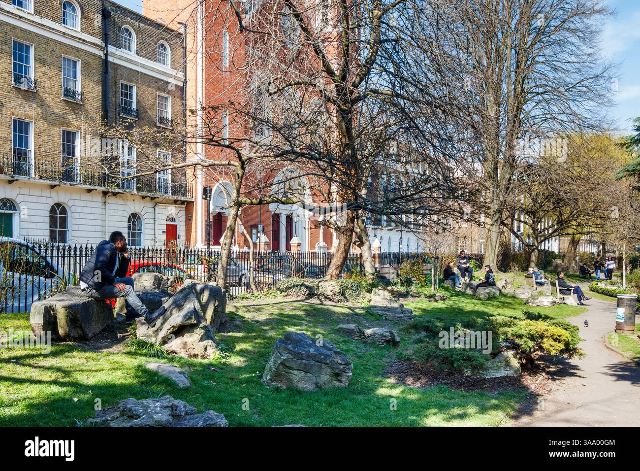 People relaxing and having a lunch break during a spell of unusually ...