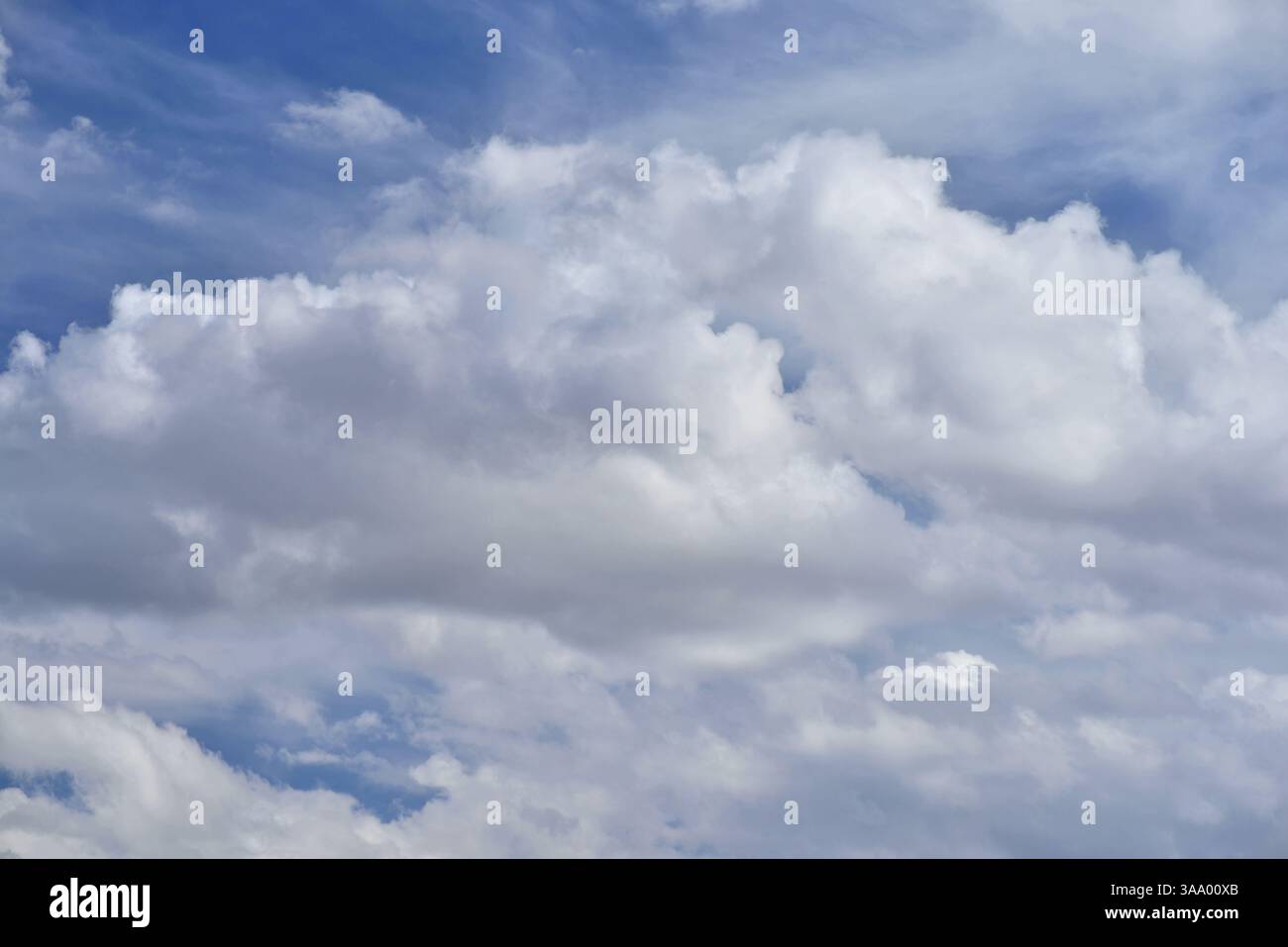 Cumulus and stratocumulus clouds in blue sky Stock Photo - Alamy