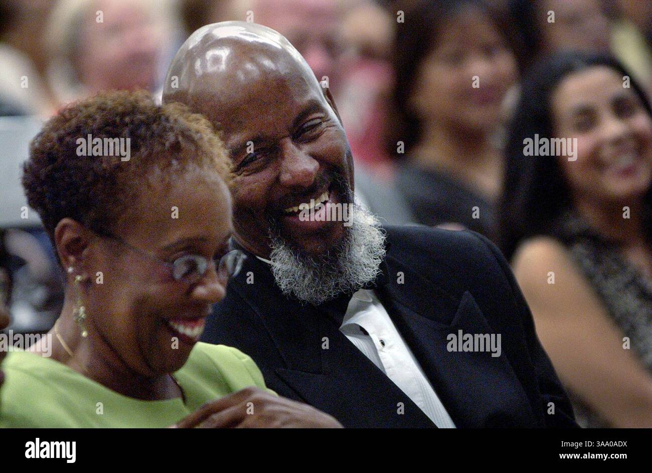 LEDE - Edward Harris Jr. (center) chuckles with his wife Imogene Harris ...