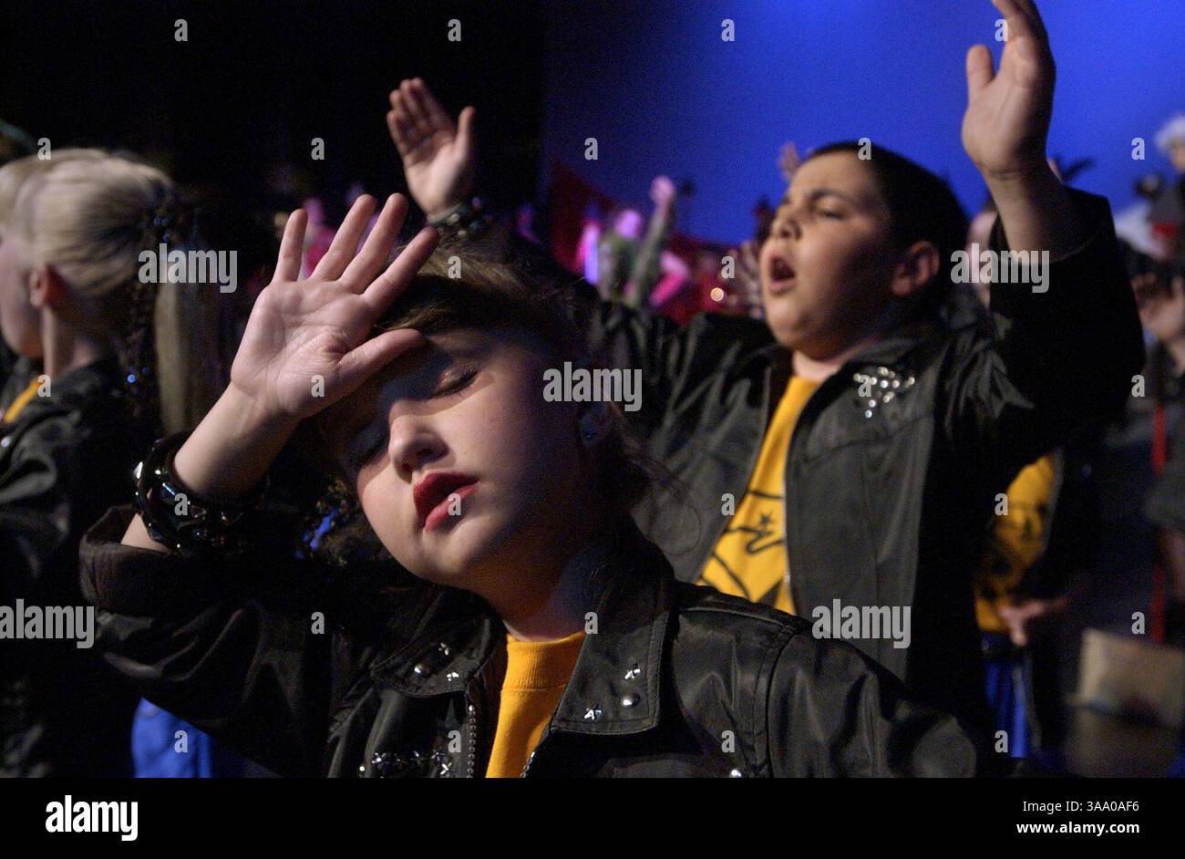 Anjie Norris (cq, left), 7, plays the role of a ''Starmite'' with the ...