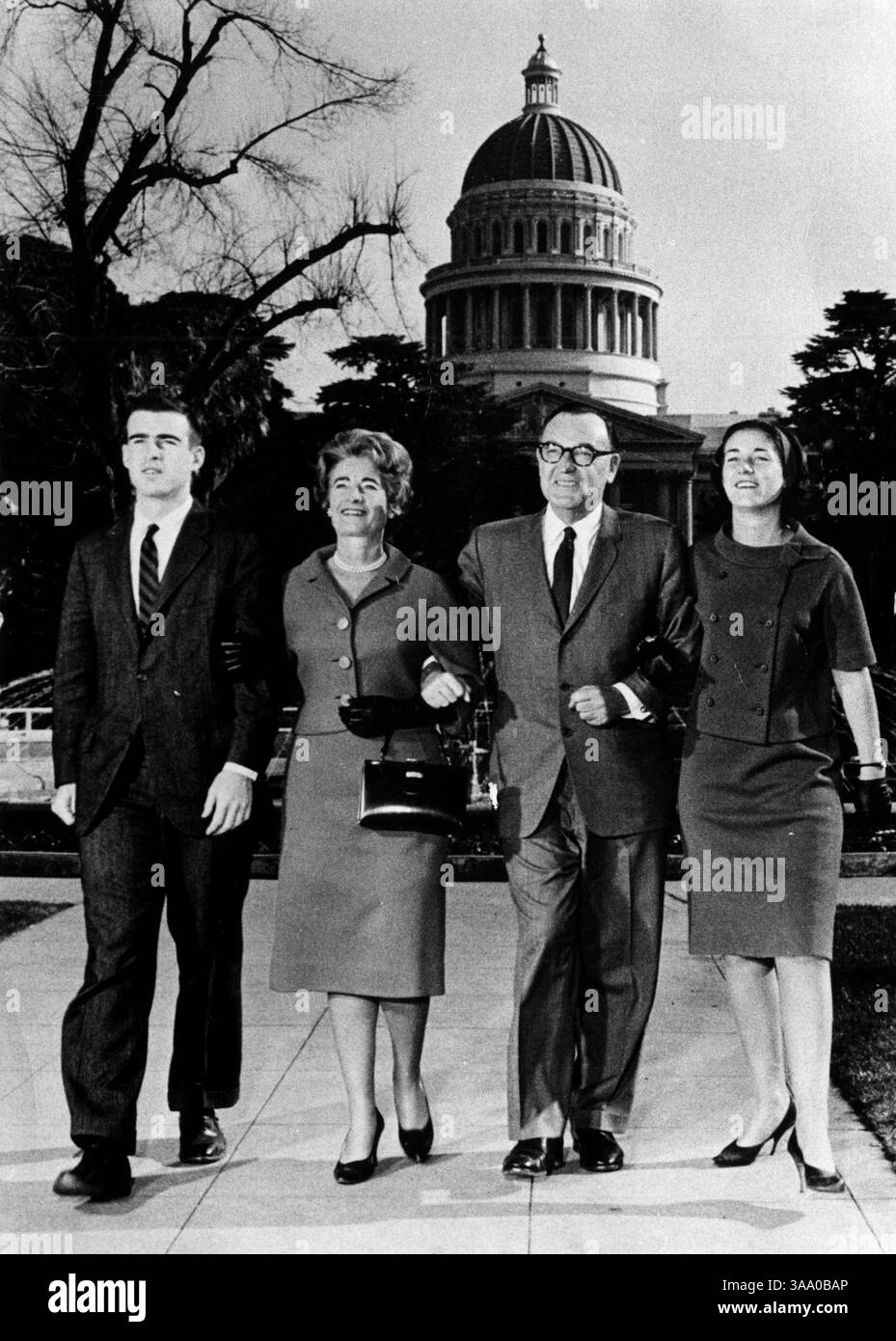 Governor Edmund G. '' Pat '' Brown poses in front of the Capital with ...