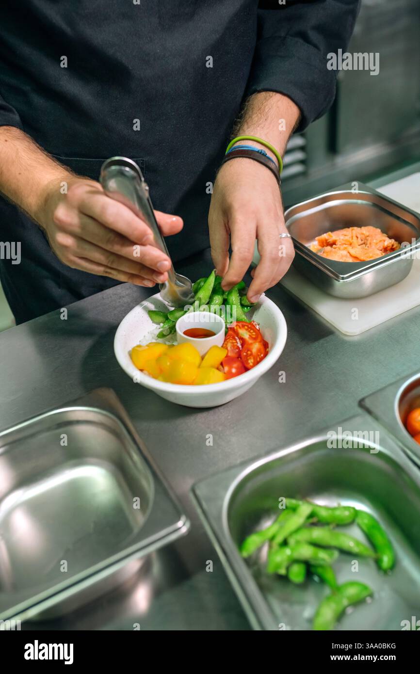 Tongs in food preparation hi-res stock photography and images - Alamy