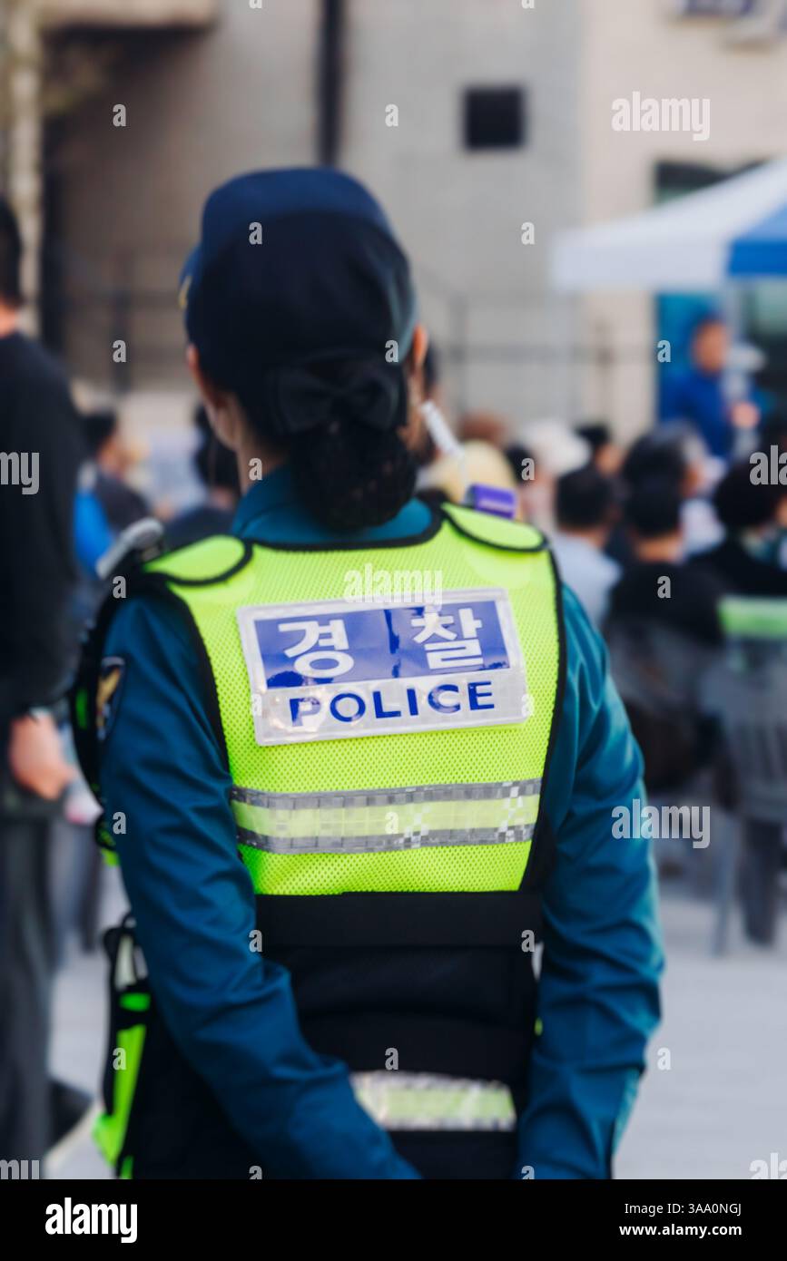 Korean police squad formation in uniform with "Police" logo, policemen ...