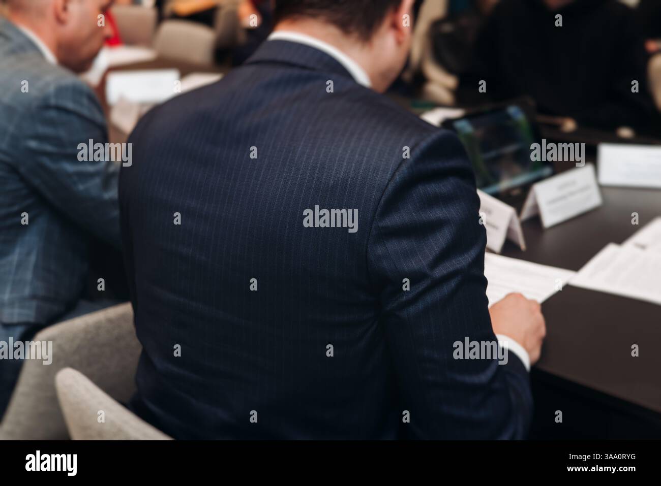 Board of directors in meeting room, Company executive director and ...