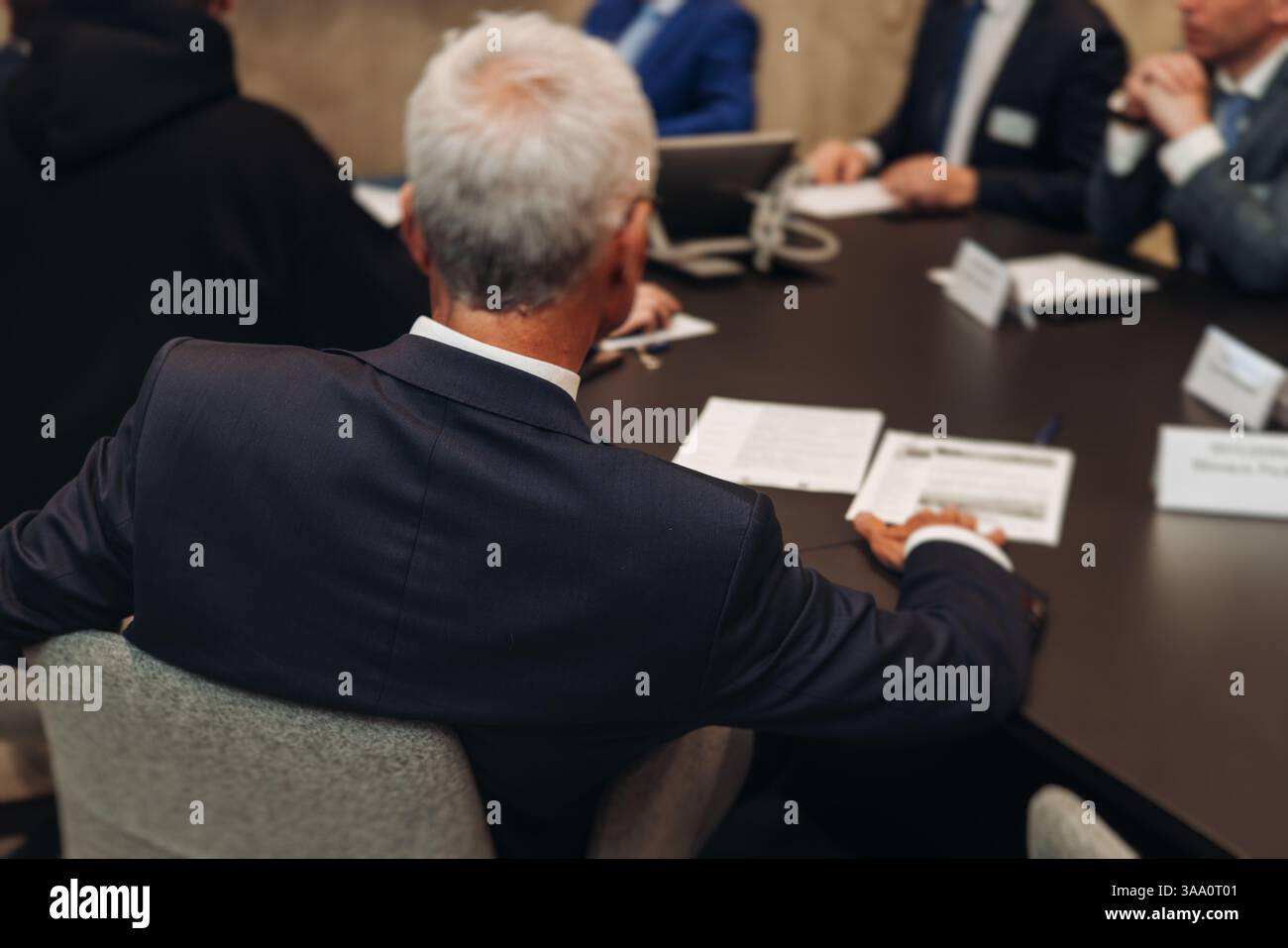 Board of directors in meeting room, Company executive director and ...