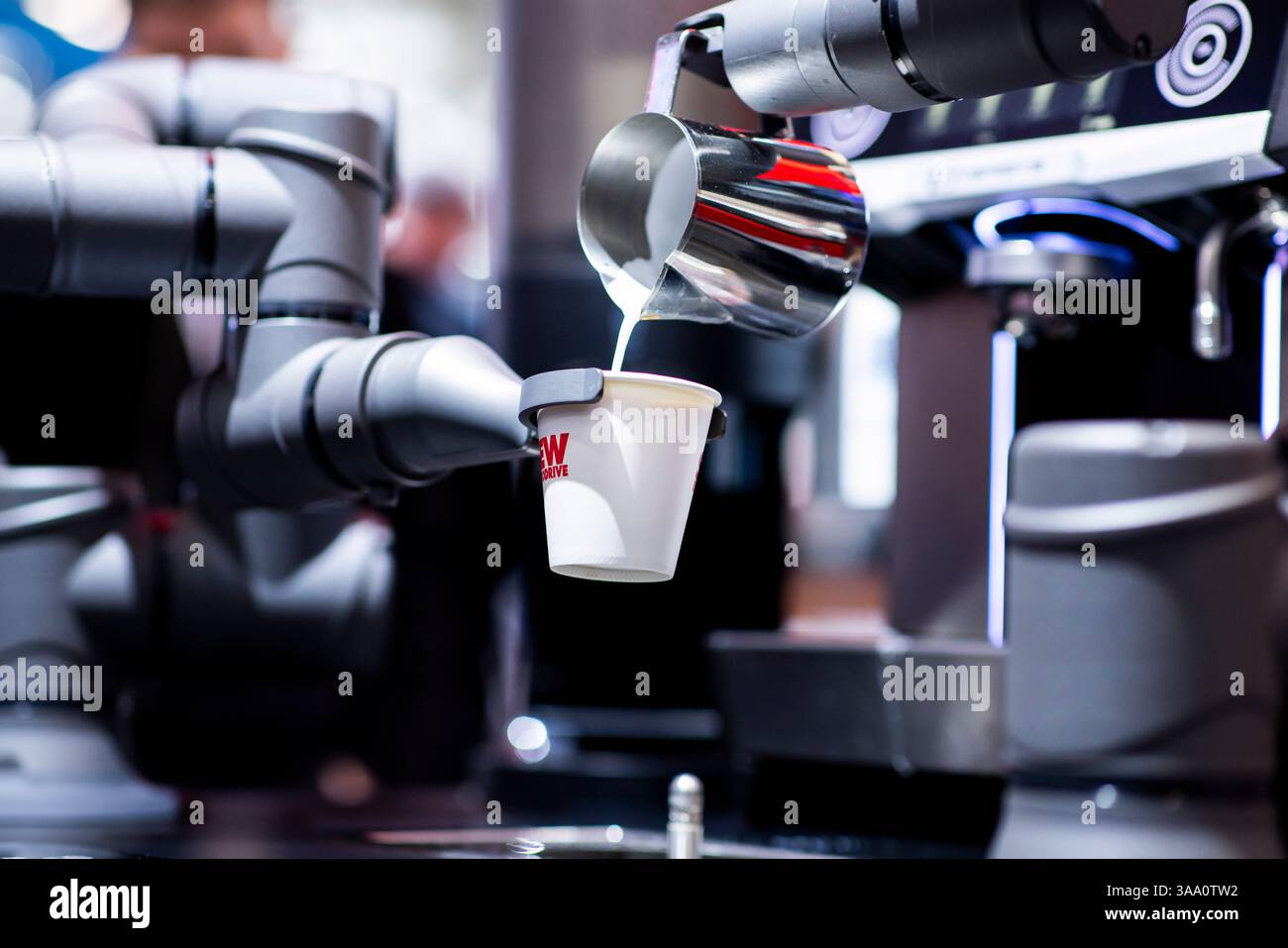 Hanover, Germany. 31st Mar, 2025. An automated barista machine prepares ...